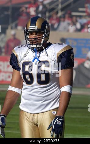 St. Louis Rams tight end Brandon Manumaleuna watches on the sidelines ...