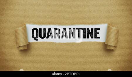 Torn paper revealing the word Quarantine Stock Photo - Alamy