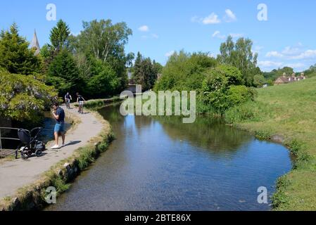 Loose Village, Kent, UK. Narrow path through a hedge into a field Stock ...