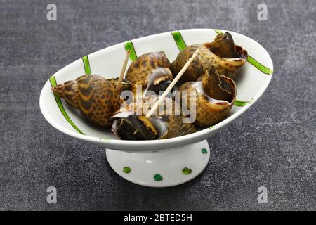 simmered baigai sea snail, japanese cuisine Stock Photo - Alamy