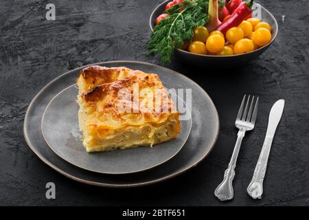 Puff pastry khachapuri with suluguni cheese. Close-up, selective focus ...