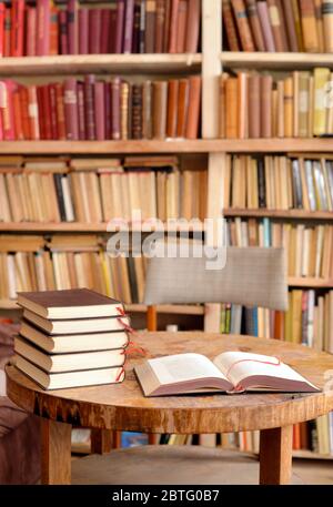 Scientific study with the many books and papers Stock Photo - Alamy