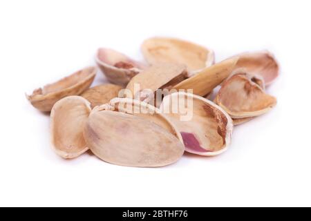 Heap of empty pistachios shells isolated on white background Stock ...