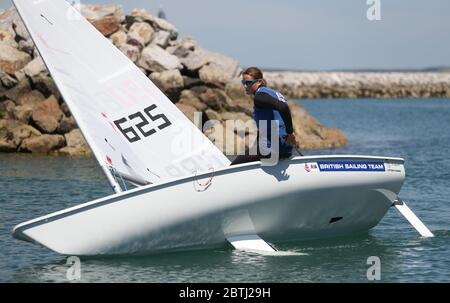Great Britain's Alison Young practices in her Laser Radial dingy at the ...