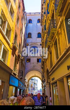 Main street leading to the famous gothic castle Karlstejn. Streed shops ...