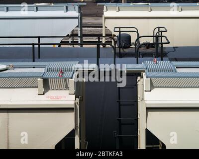 Close up of railroad hopper cars in rail yard Stock Photo - Alamy