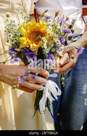 Happy gorgeous bride and stylish handsome groom on background of an ...