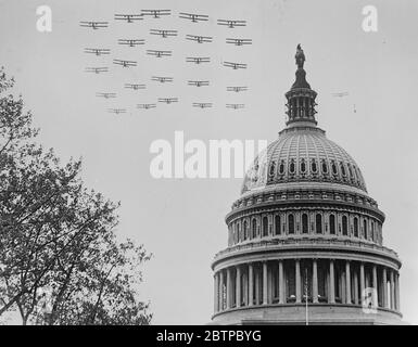 Formation of five planes flying in a single file. The photograph ...