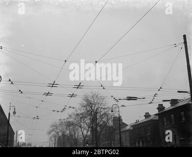 Overhead electrical trolleybus wires . 1937 Stock Photo - Alamy