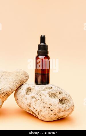 Beautiful composition with bottle of essential oil and natural ...