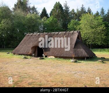 A view of the reconstructed Iron Age farm below Butser Hill Stock Photo ...