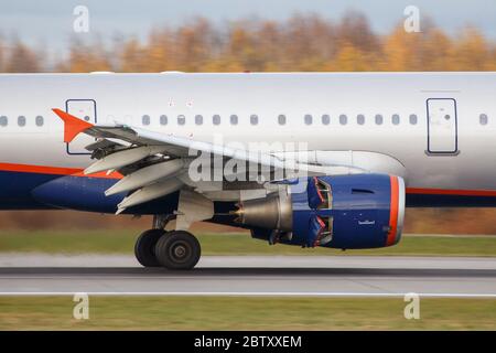 detail of landing airplane - back view Stock Photo - Alamy