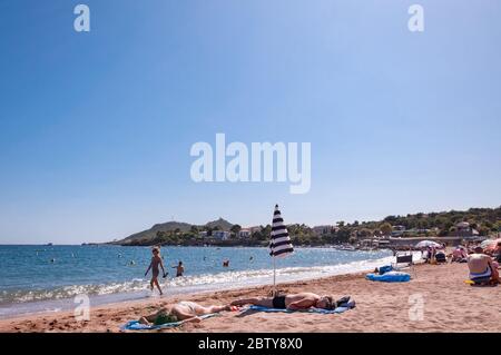 Agay beach and coast with people sunbathing, France Stock Photo - Alamy