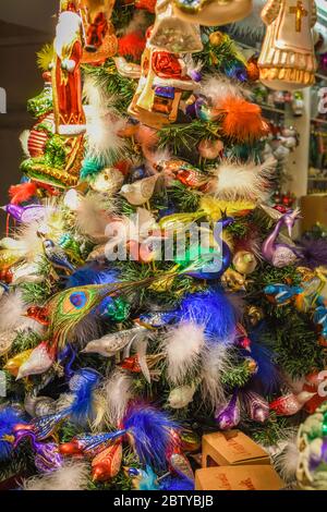 Christmas ball with skates on colored background. decoration bauble ...