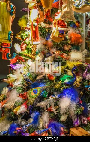 Christmas ball with skates on colored background. decoration bauble ...