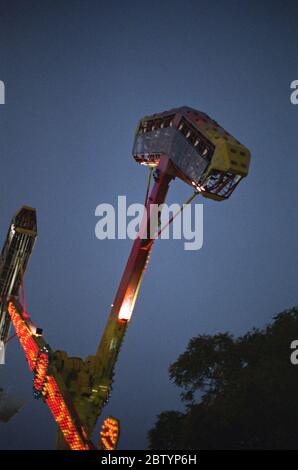 Double Pendulum Kamikaze Amusement Park Thrill Ride in Hall Stock Photo ...