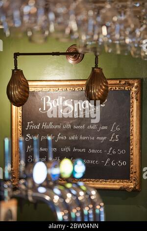 Interior of The Milton Hare pub in Milton-under-Wychwood, Oxfordshire ...