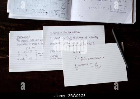 GCSE physics revision with flash cards and exercise book Stock Photo ...