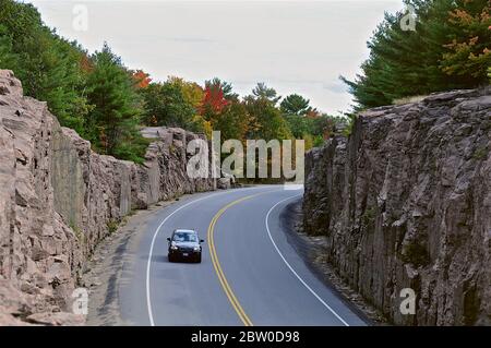 A highway cut through a hill Stock Photo - Alamy