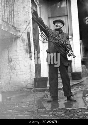 A Day in the life of a chimney sweep. A chimney sweeps readies his ...