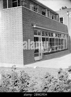 Lord Hanworth opens Eltham Hospital's new wing. Nurses being inspected ...