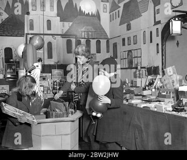 Lady Verney (striped scarf) in the toy and bookshop she has opened in ...