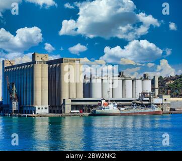 Grain Silos and Wharf Ship Loading Cranes at Port of Newcastle Stock ...
