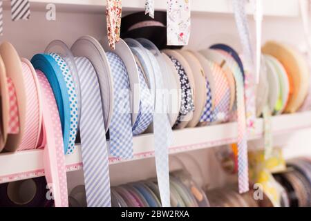 Colorful ribbons on counter in store Stock Photo - Alamy
