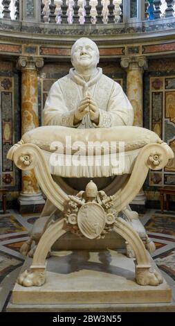 Rome. Italy. Statue of Pope Pius IX kneeling in prayer at the crypt of ...