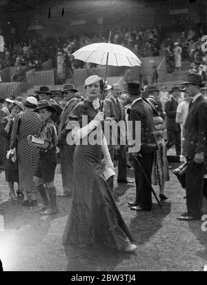 LONDON, ENGLAND - JUNE 20: Spectators form a snake with beer cups ...