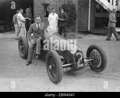Race car drivers Stock Photo - Alamy