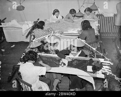 NORMAN HARTNELL - English fashion designer in his salon at 26 Bruton ...