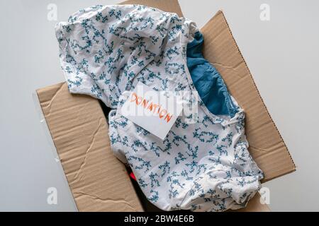 Children property in carton on table in room Stock Photo - Alamy