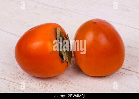 Sweet tasty rioe persimmon fruit Stock Photo - Alamy