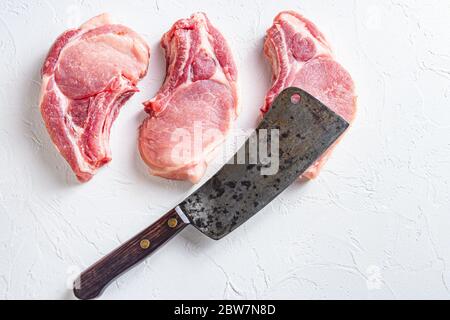 Raw pork meat for baking over wooden background Stock Photo - Alamy