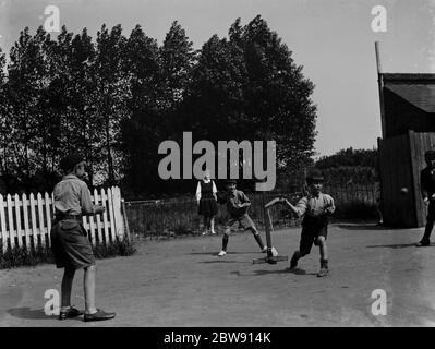 Children playing a game of stoolball in Hartley , Kent . 1937 Stock ...