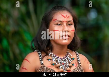 Peruvian girls dressed in traditional celebratory garb meet visitors ...