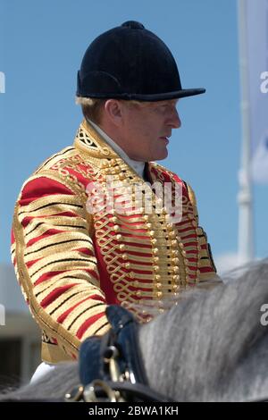 footman on Queens coach Stock Photo - Alamy