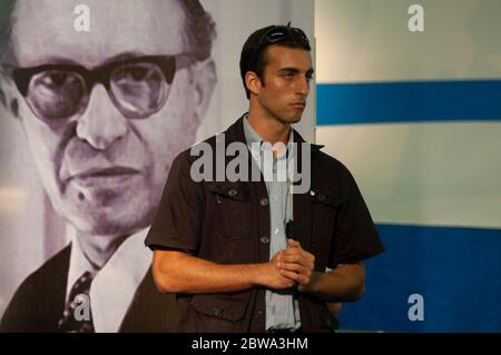Israeli "Shabak" bodyguard stand guard in front of a poster with ...