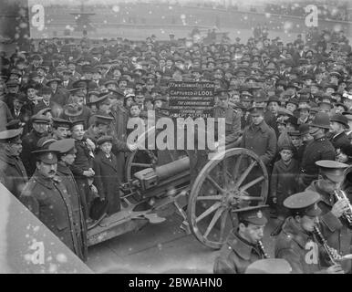 A German gun ( 77mm Feld Kanone (field gun) ) captured at Loos , at a ...