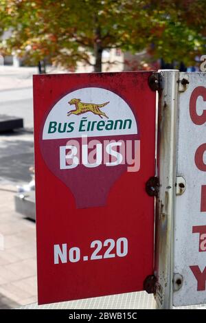 A Bus Eireann bus stop sign (and logo) in Cahir, Ireland (Eire Stock ...