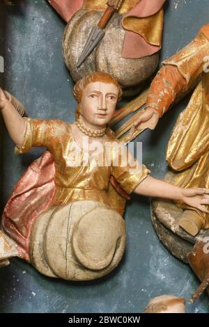 catholic statue of lady helper Stock Photo - Alamy