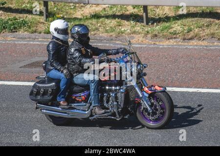 Two up riding on a Harley-Davidson touring motorbike motorcycle Stock ...