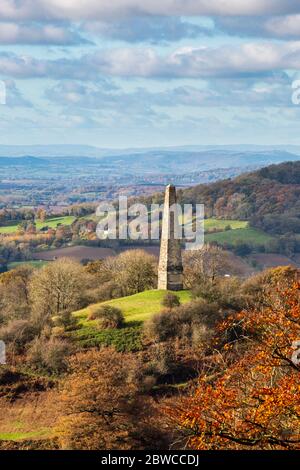 An autumn view of Eastnor castle Obelisk in the Malvern Hills, England ...