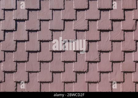A wall of red shingles with cement. Clay tile tiles horizontally Stock ...