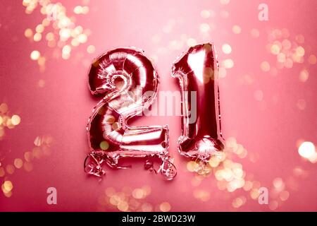 Silver number 21 party balloons isolated on a white background with ...