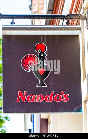 Nando's chicken restaurant logo and sign Stock Photo - Alamy