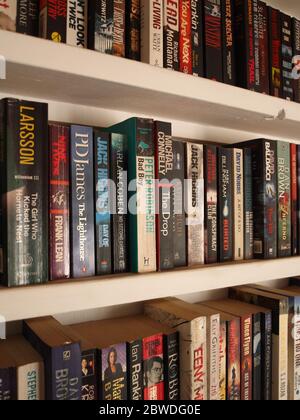 Bookshelves full of second hand paperbacks Stock Photo - Alamy