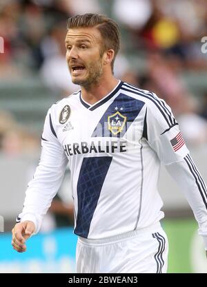 David Beckham kicking football during game, February 2011 Stock Photo ...