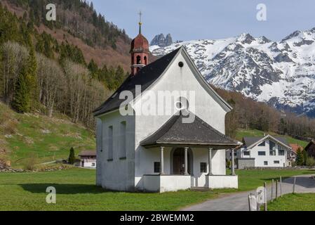 Small church on the valley of Engelberg in the Swiss alps Stock Photo ...